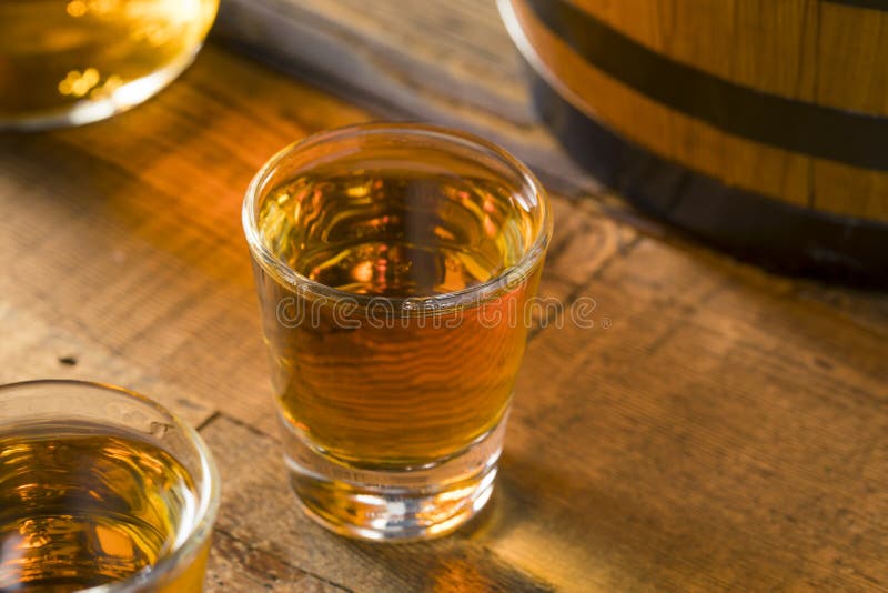 Alcoholic Brown Rum in a Shot Glass Stock Image - Image of reflection ...