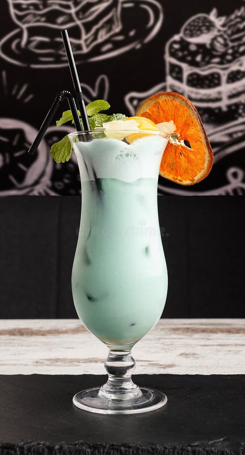 Alcoholic Cocktail Blue Lagoon on a Wooden Table Stock Image - Image of ...