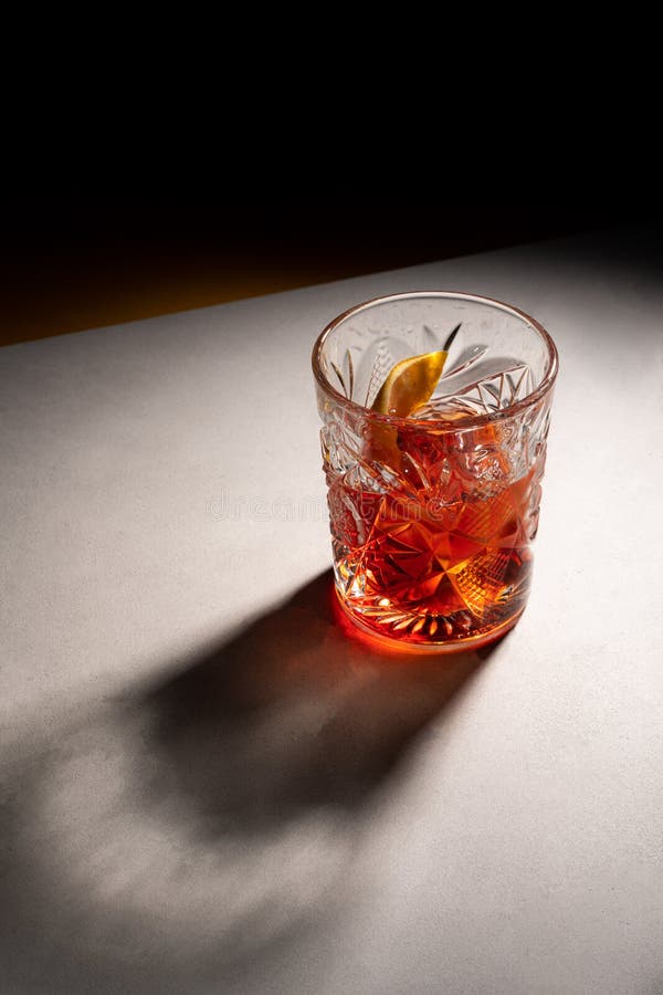 Alcoholic Cocktail with Lemon in a Glass Crystal Glass Shadow Stock ...