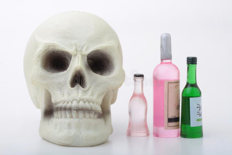 Alcoholic Drinks Bottles with an Human Skull Stock Image - Image of ...