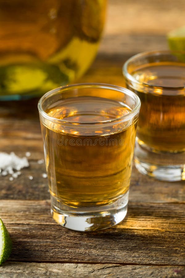 Alcoholic Reposado Tequila Shots Stock Photo - Image of booze, drink ...