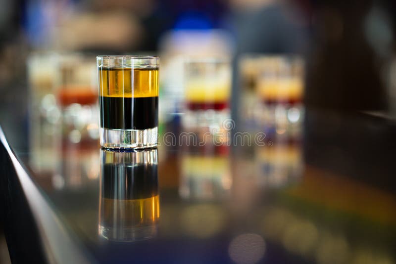 Alcoholic shots at the bar stock photo. Image of alcoholic - 266154816