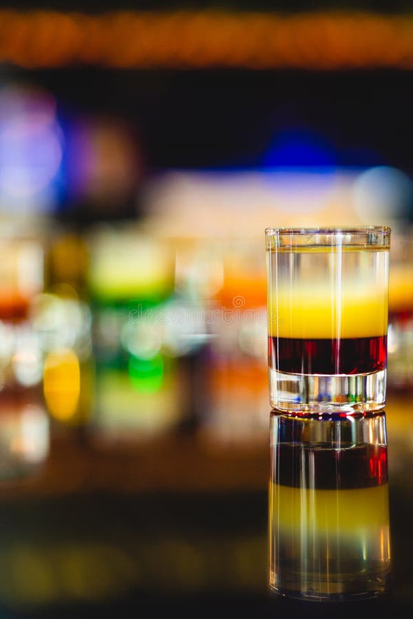 Alcoholic shots at the bar stock photo. Image of party - 266154824