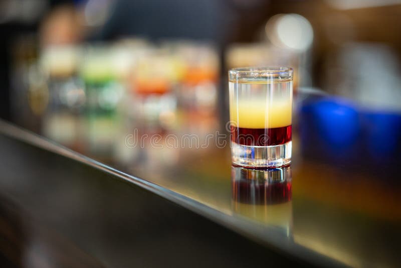 Alcoholic shots at the bar stock image. Image of closeup - 266154831