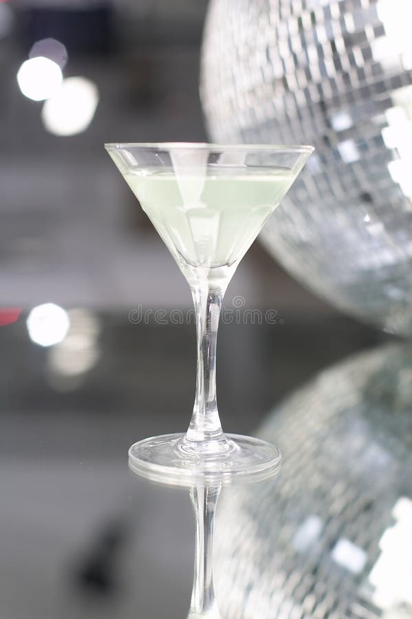 Cocktail on glass table stock image. Image of lights - 113793751