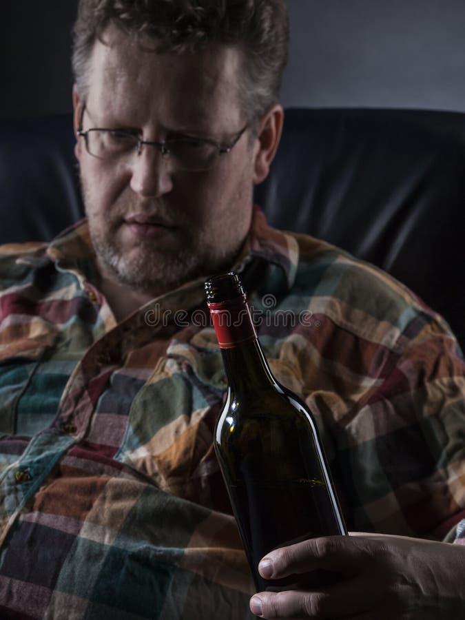 Alcoholism stock image. Image of alcohol, drunkard, sitting - 48812081