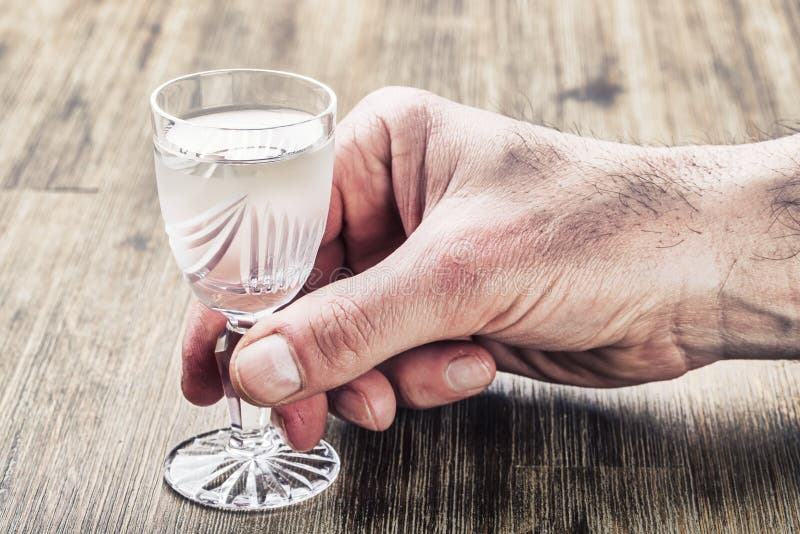 Alcoholism. Man Hand Alcoholic and Drink the Distillate Stock Photo ...