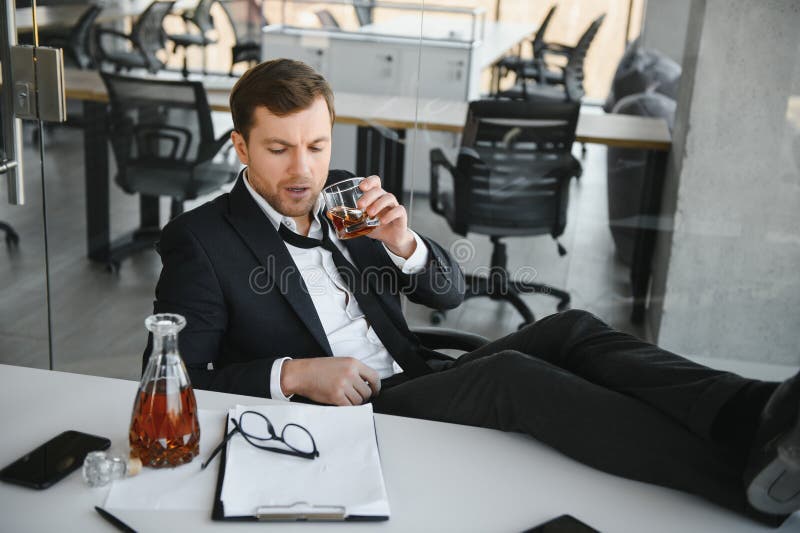 Alcoholism at Work. Tired Employee Drinking Alcohol at Workplace, Can ...