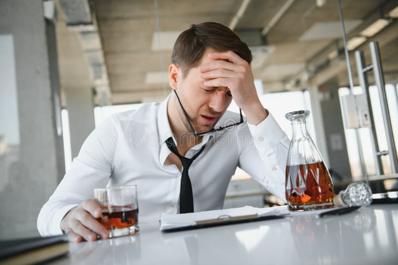 Alcoholism at Work. Tired Employee Drinking Alcohol at Workplace, Can ...