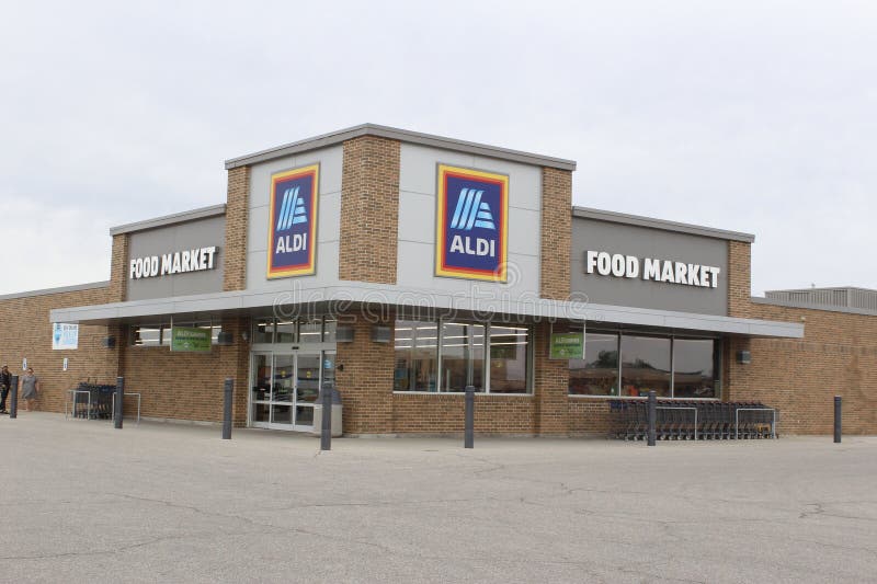 Aldi Advertisement Sign on a Building with a White Sky Outdoors ...