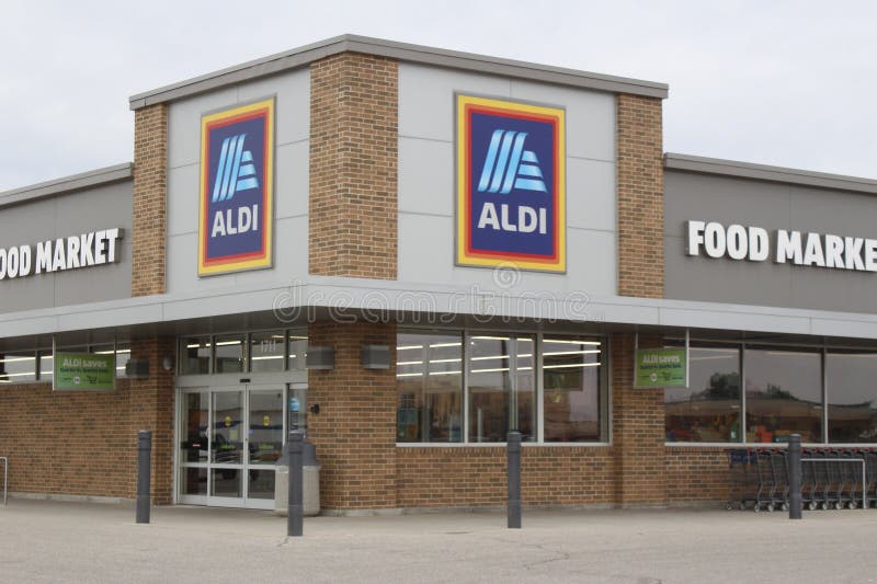 Aldi Advertisement Sign on a Building with a White Sky Outdoors ...