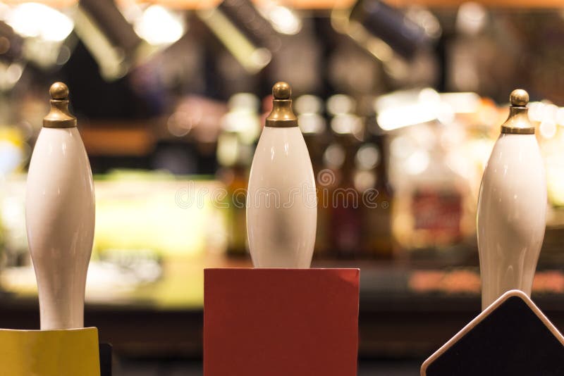 Beer taps London pub editorial stock photo. Image of nicholson - 54558768