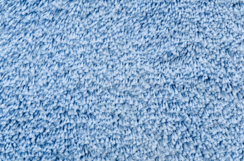 Alfombra azul foto de archivo. Imagen de textura, alfombra - 25334002