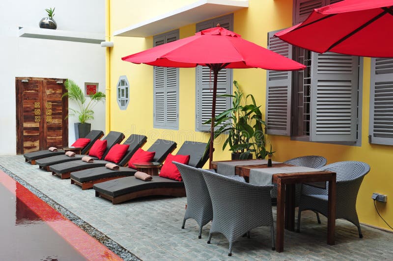 Alfresco dining area stock photo. Image of pool, towel - 26308712