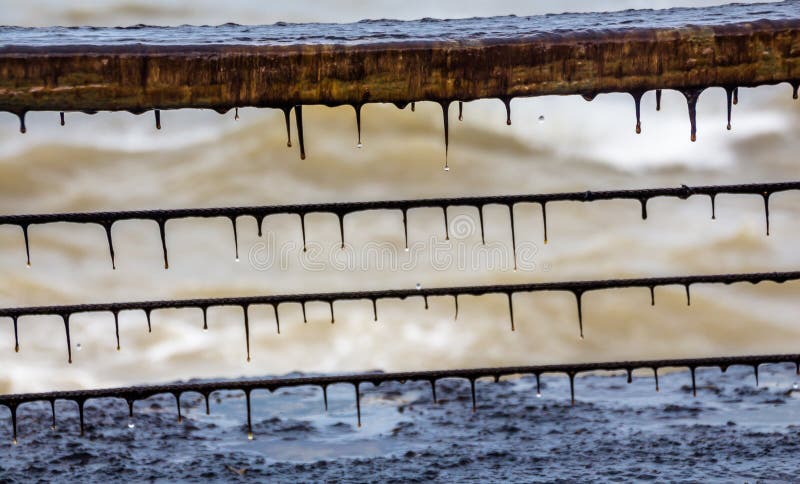 Algae Growing on Pier Railing, with Stormy Sea Waves Foam and Water ...