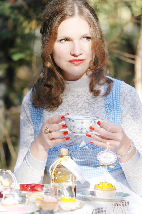 Alice in Wonderland Tea Party Stock Photo - Image of nice, girl: 23050276