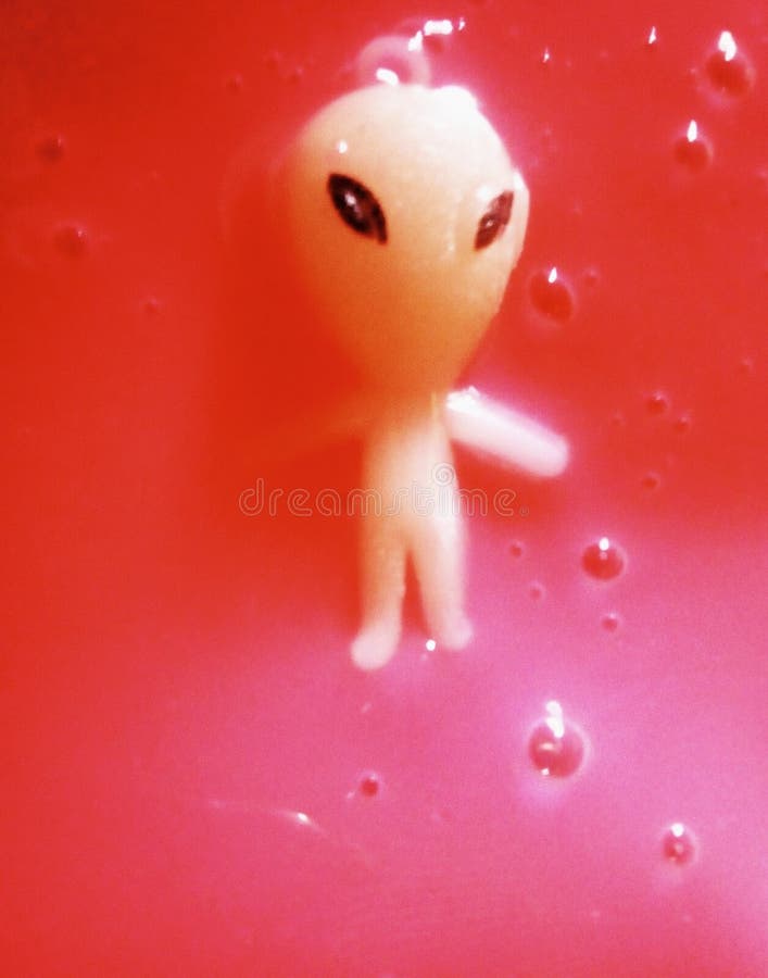 Alien in slime stock image. Image of orange, pink, lying - 140003723