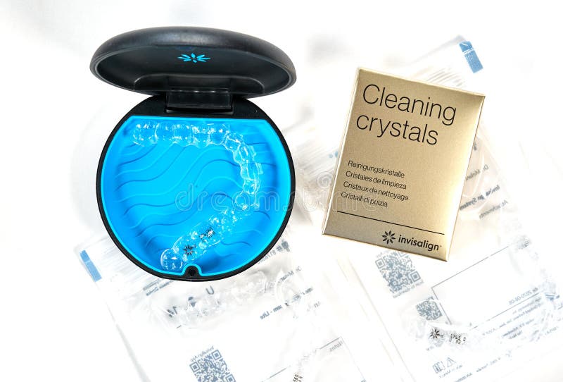 Align Technology Invisalign Aligners in a Case Over White Background ...