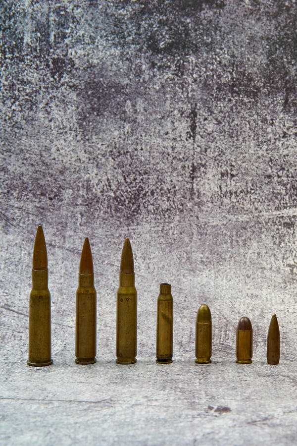 Aligned Bullets of Different Calibres. Stock Photo - Image of ...