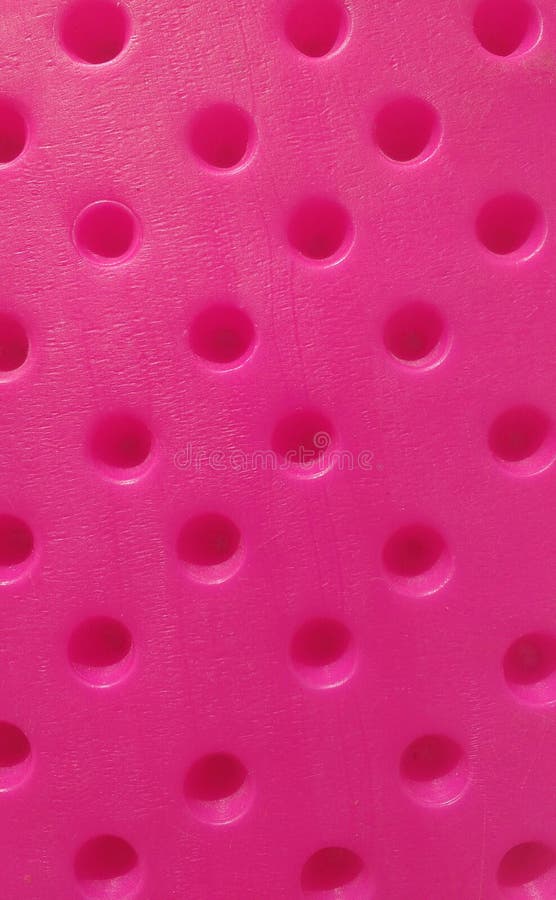 Aligned holes on plastic stock image. Image of holes - 82971635