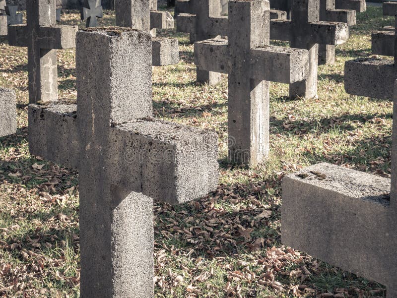 Aligned Solid Stone Crosses in a Cemetery Stock Photo - Image of ...