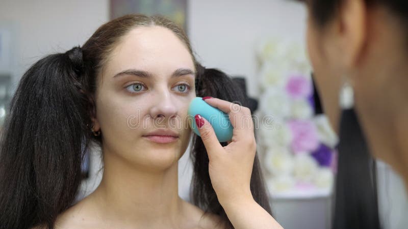 Face Makeup. Alignment of the Skin Texture with a Sponge and Powder ...