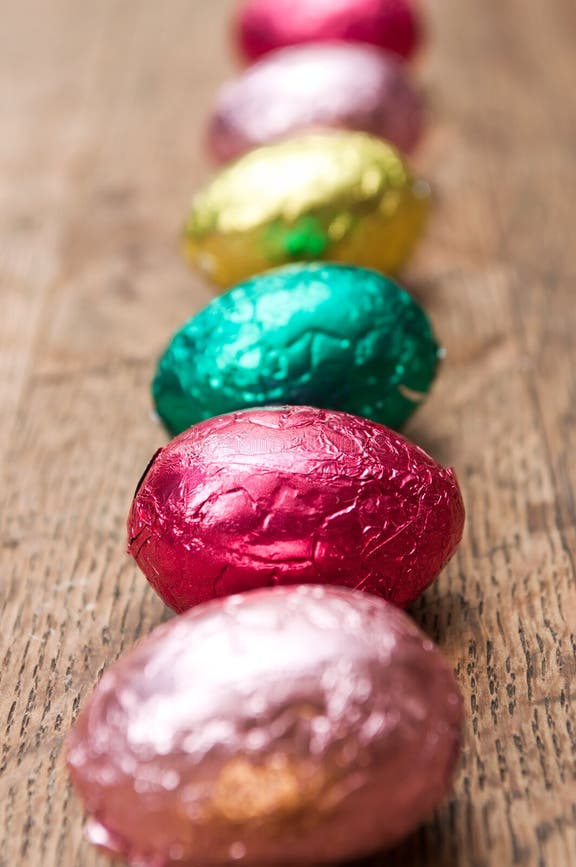 Alignment of Various Color Chocolate Easter Eggs Stock Image - Image of ...