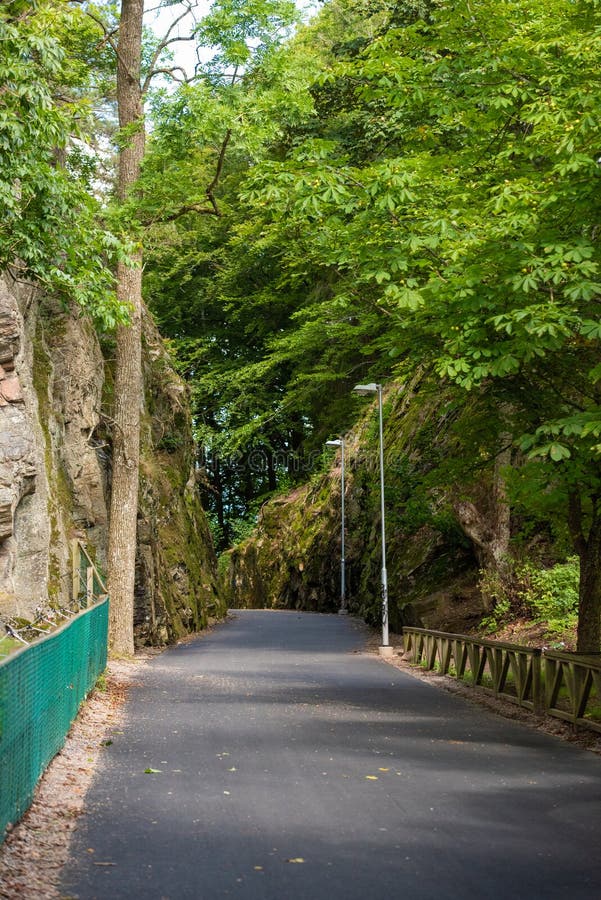 Newly Paved Path through a Small Pass between To Rock Cliffs ...