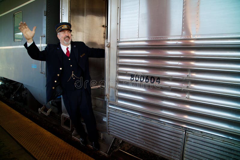 Train Conductor Waving on Train Editorial Photo - Image of ...