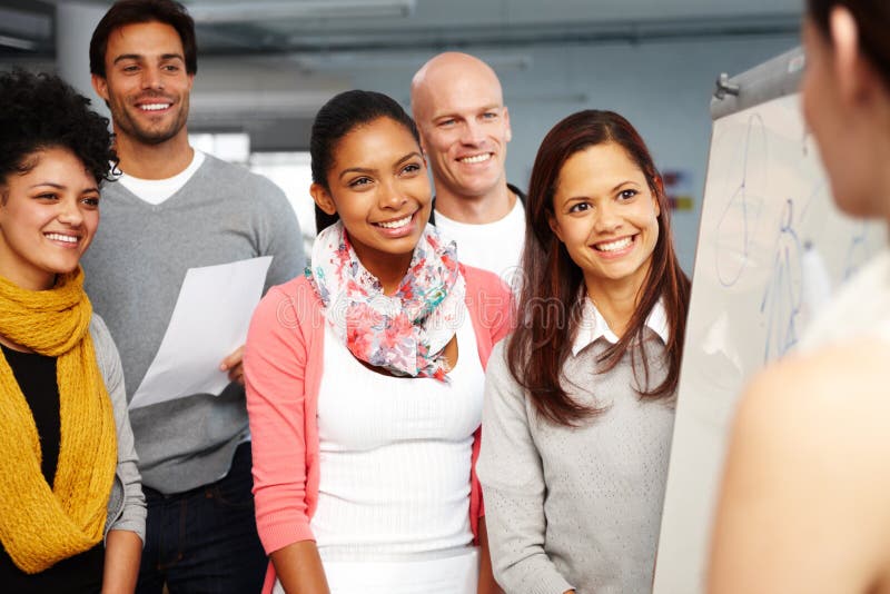 All in a Days Work. a Diverse Group of Colleagues in an Office. Stock ...