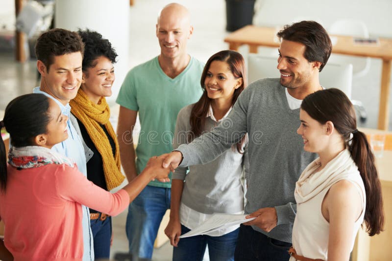 All in a Days Work. Shot of a Diverse Group of Colleagues in an Office ...