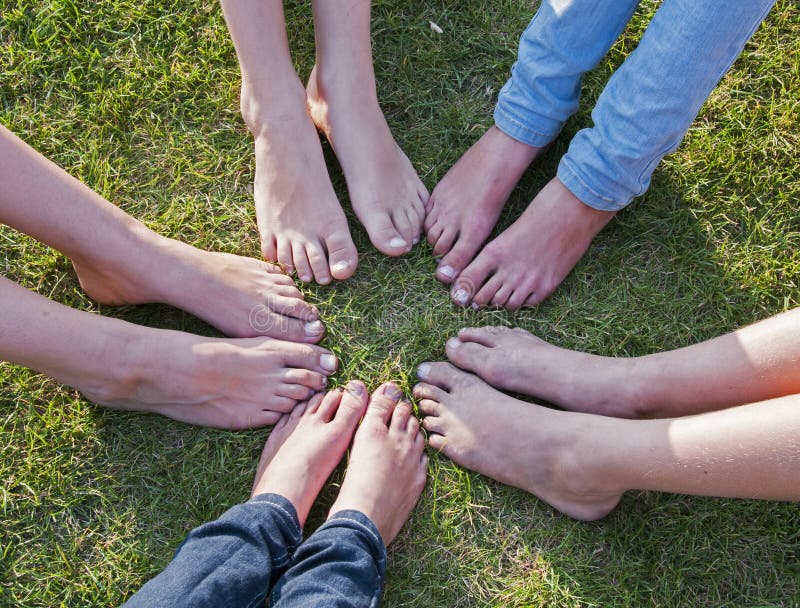 Boy with His Feet Together in the Air Stock Photo - Image of making ...