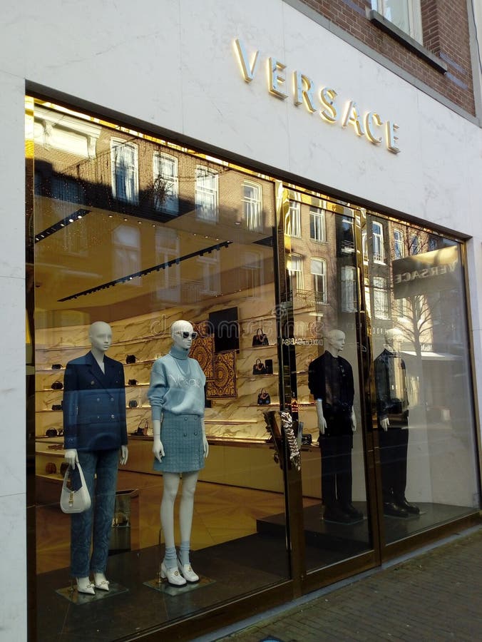 Versace store in Amsterdam editorial photography. Image of shopping ...
