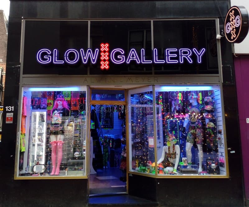 Glow Gallery store editorial stock image. Image of celebration - 303699929