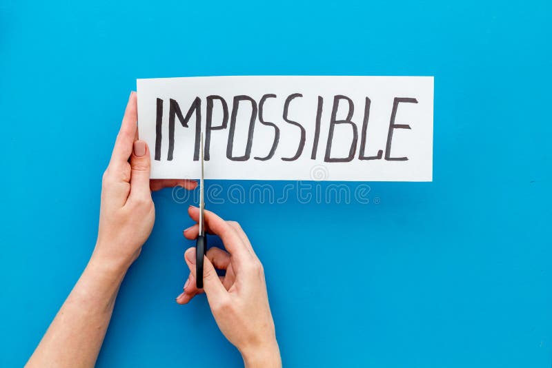 All is Possible Concept. Hands Cut Word Impossible on Blue Background ...