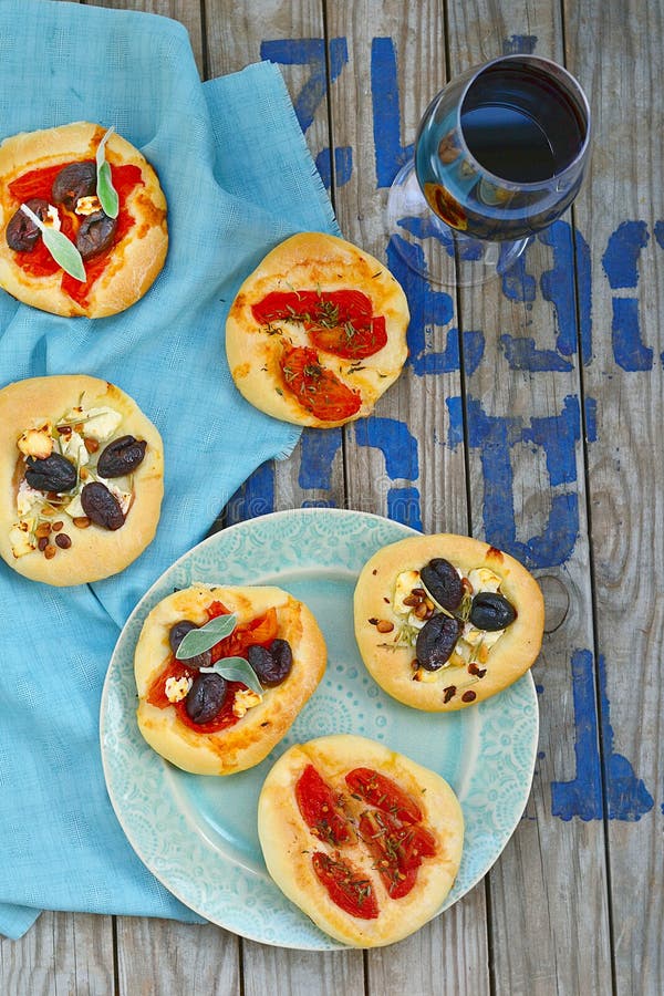 All Sorts of Mini Pizzas. Italian Cuisine Stock Photo - Image of olives ...