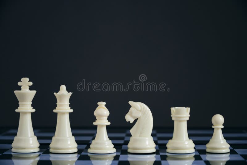All Suits White Chess Pieces on Chess Board Stock Photo - Image of move ...