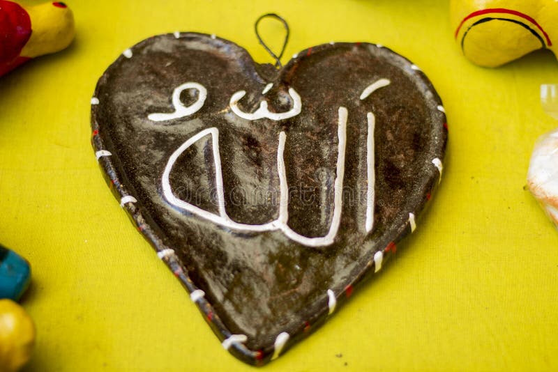 Allahu is Written on a Design Made of Clay and Its Back is Blurred ...