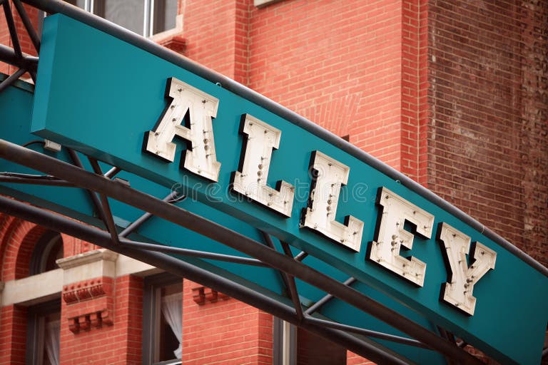The Alley stock photo. Image of bars, sign, tourist, brick - 2807048