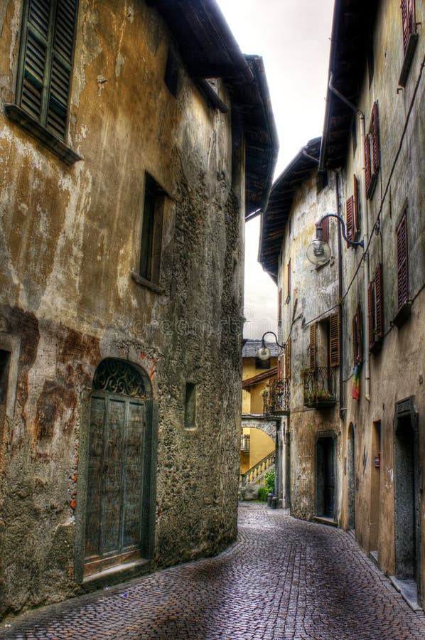 Alley between buildings stock image. Image of road, scrostato - 6649291