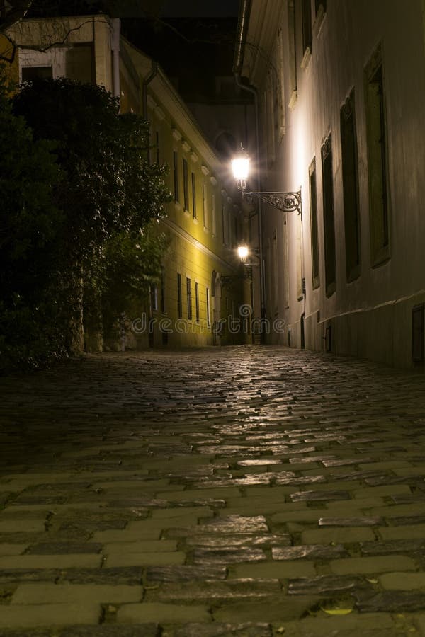 Alley way at night stock image. Image of night, lights - 68934347