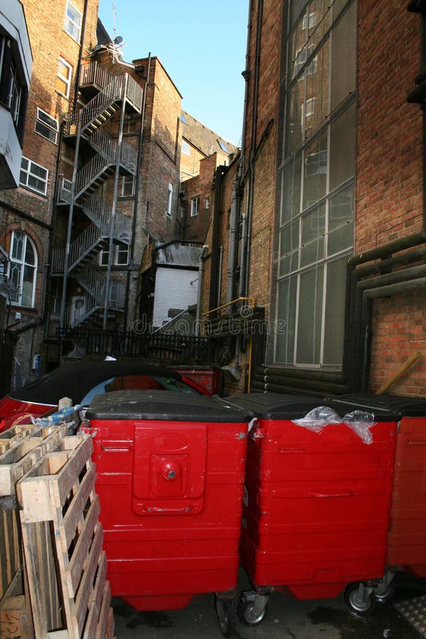 Looking Down a Long Dark Back Alley Stock Image - Image of light, alley ...