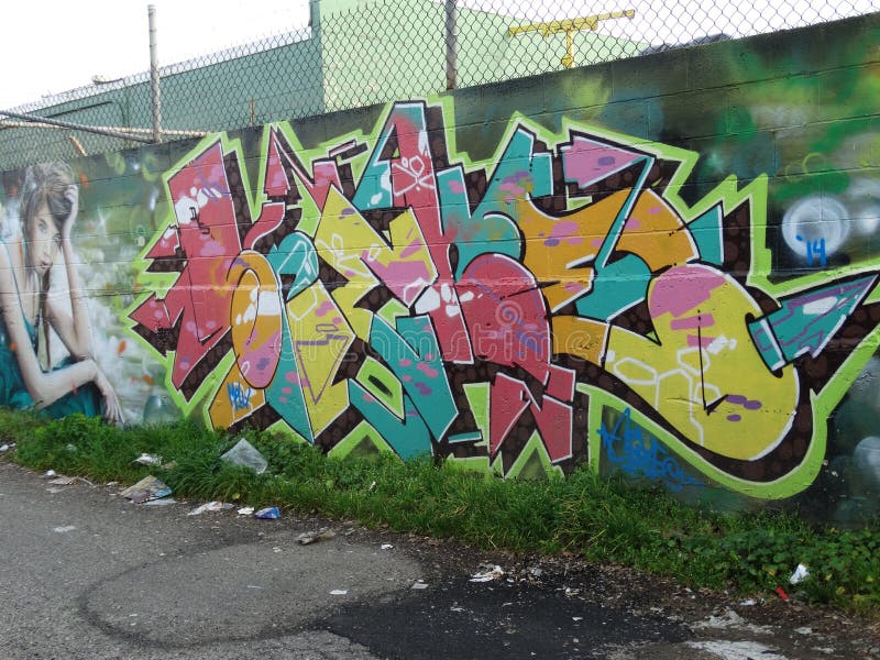 Alleyway Graffiti editorial stock image. Image of orange - 56784904