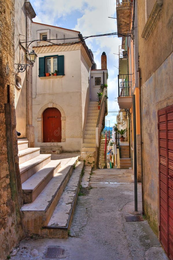 Alleyway. Ischitella. Puglia. Italy. Stock Photo - Image of balcony ...