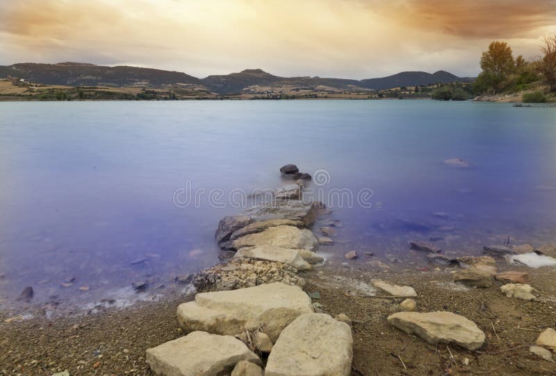 The Alloz reservoir stock photo. Image of sunset, lake - 101226820