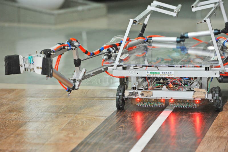 Almaty, Kazakhstan - 10.02.2012 : Robot Assistant with Remote Control ...