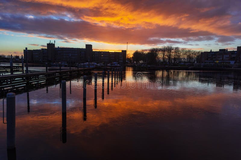 Almere Harbour, Evening Light with Ice on the Water during the Setting ...