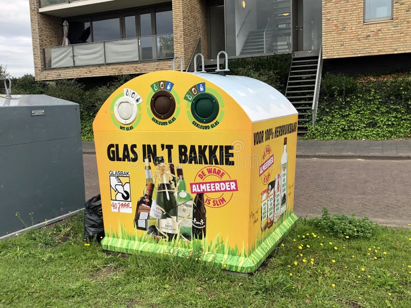 Yellow Glass Recycle Container. Editorial Stock Photo - Image of sign ...