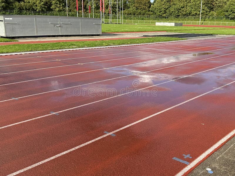Wet running track editorial photo. Image of race, editorial - 286984736