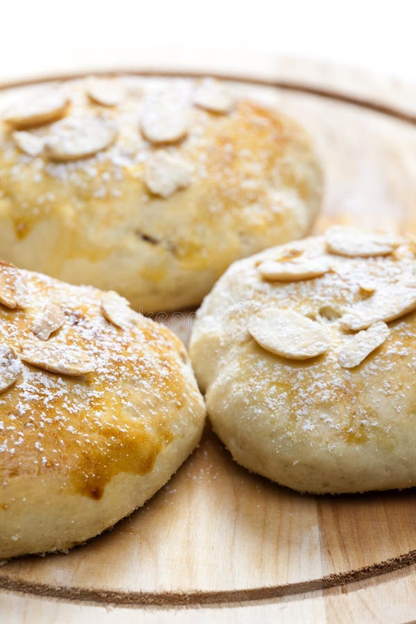 Almond Buns on Wooden Board Stock Photo - Image of high, board: 247966202